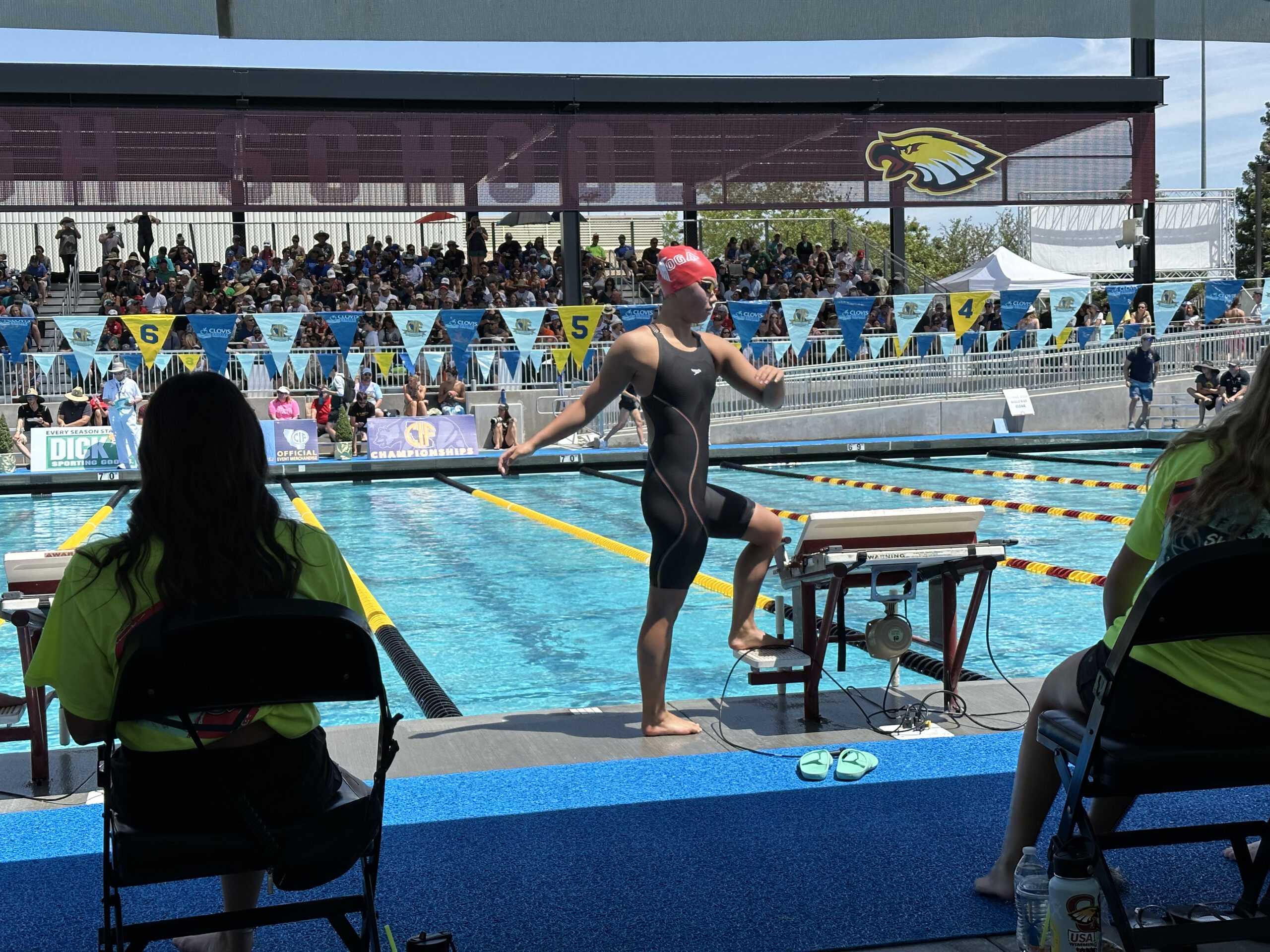 Swimming superstar: Freshman makes school history with state meet win ...
